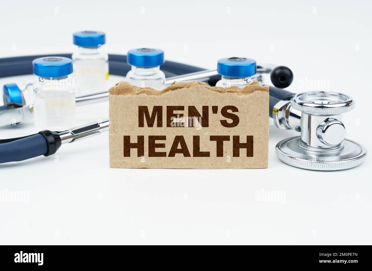 Medicine and health concept. On a white table lie ampoules, a ...