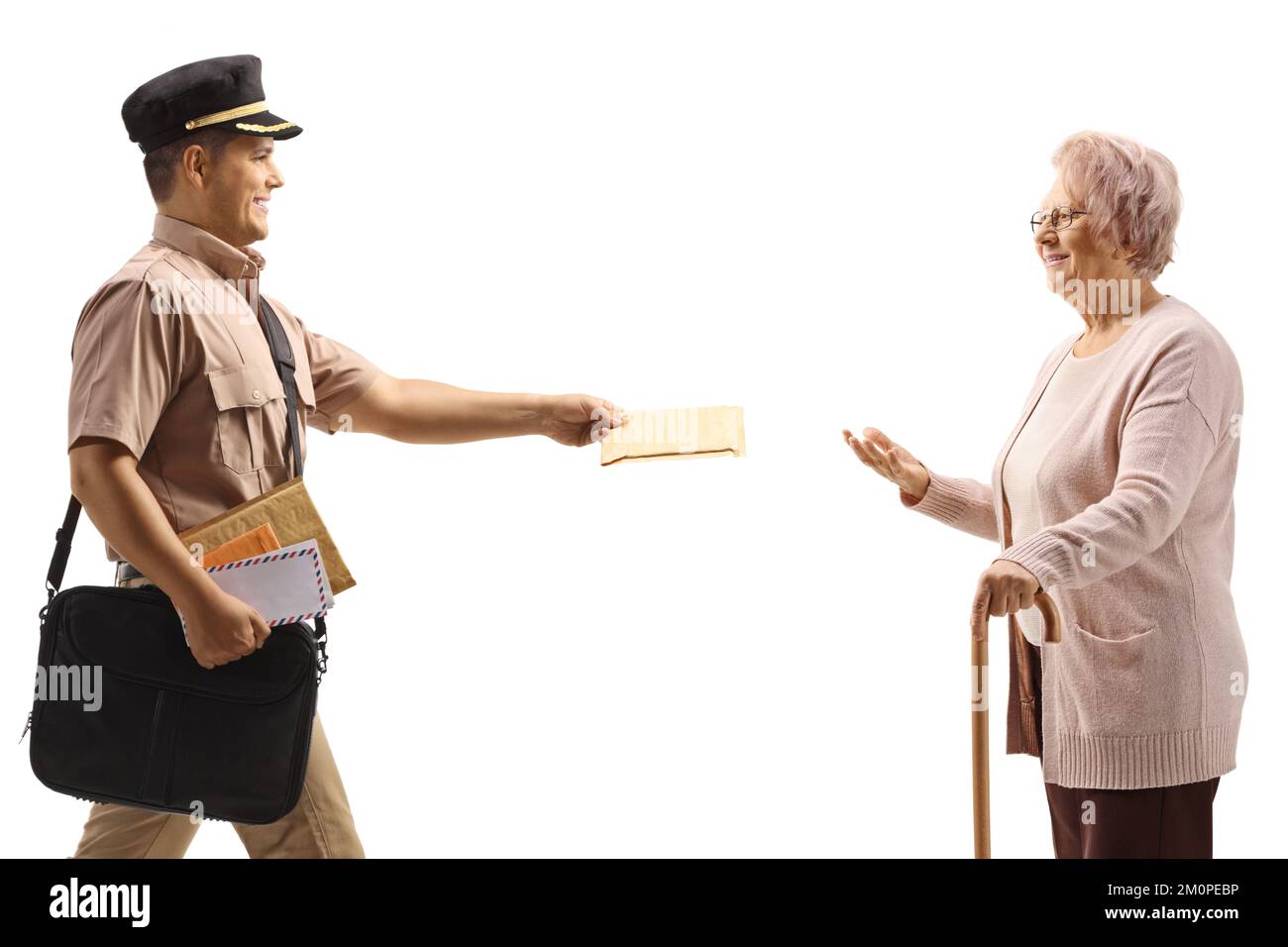 Profile shot of a mailman delivering a letter to an elderly lady ...