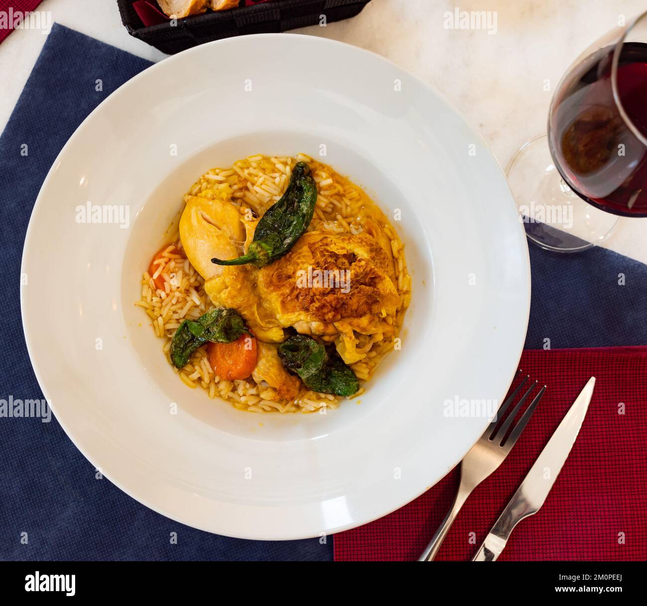 Traditional french cuisine, сhicken thigh curry with rice Stock Photo ...
