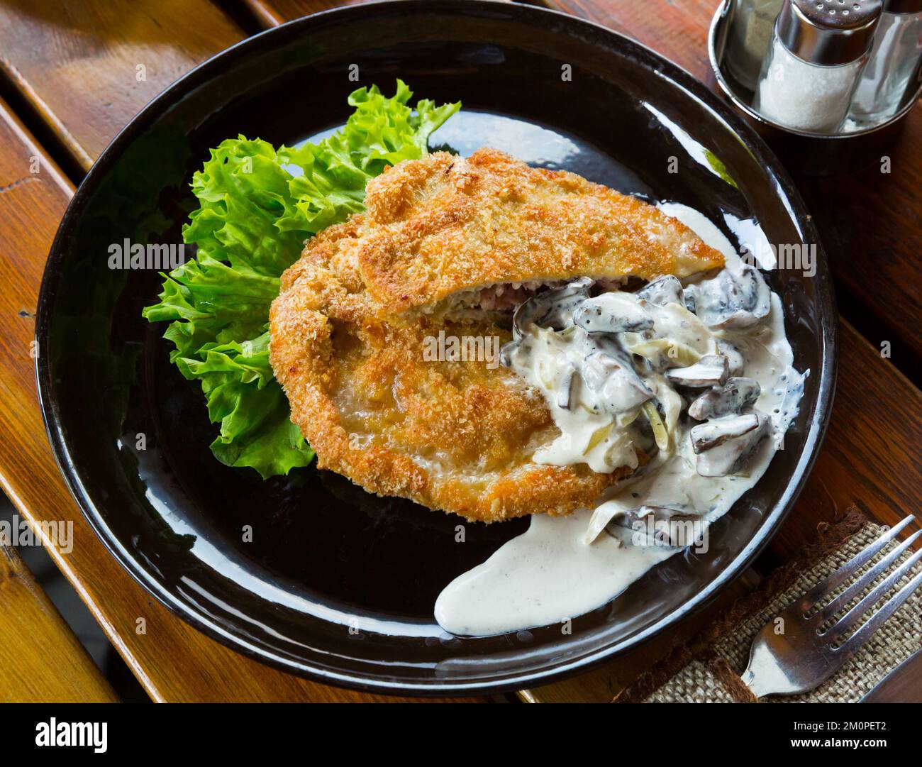 Schnitzel with mushrooms Stock Photo - Alamy