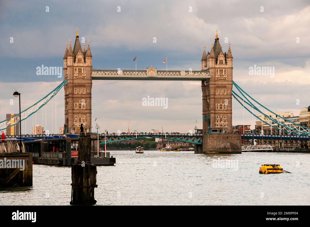 Tower Bridge in London is a combined bascule and suspension bridge over ...