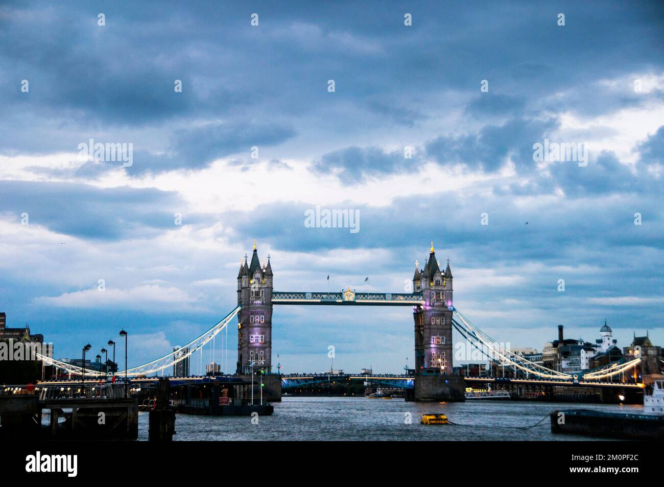 Tower Bridge in London is a combined bascule and suspension bridge over ...
