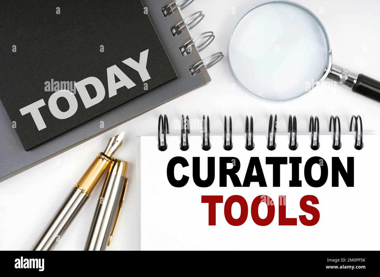 Business and finance concept. On the table are a pen and notebooks with ...