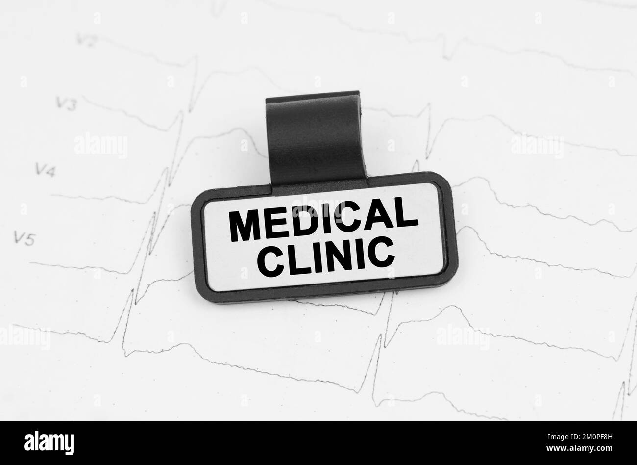 Medicine and health concept. There is a plate on the cardiogram with ...