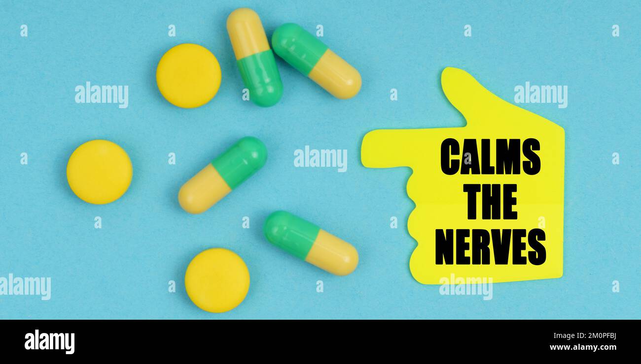Medicine and health concept. On a blue background, there are pills and ...
