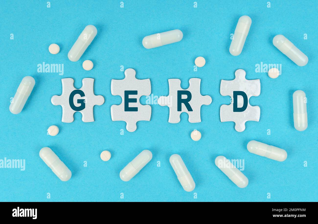 Medicine and health. On a blue background, there are pills and puzzles ...