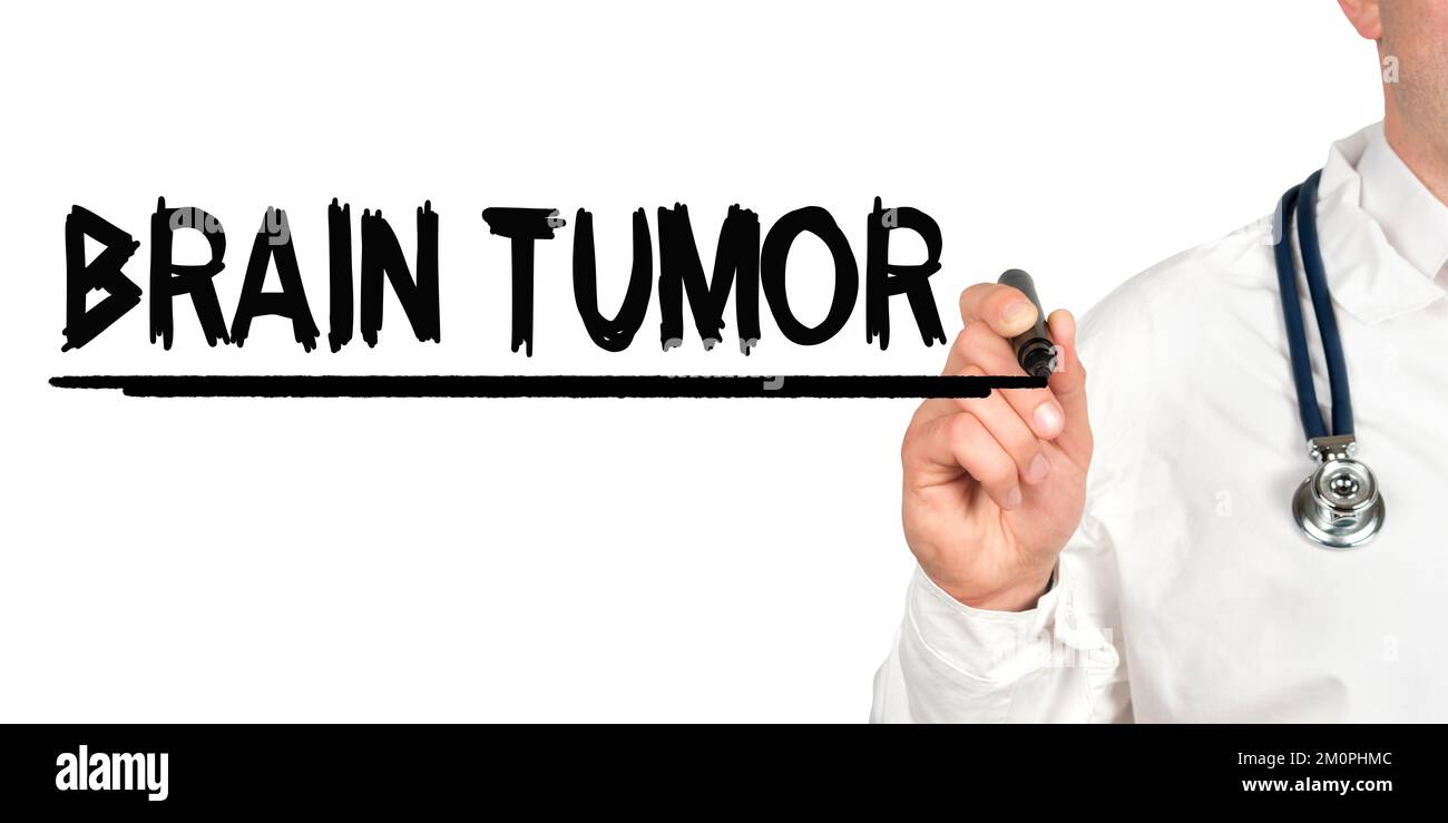 Medicine concept. Doctor writes the word - BRAIN TUMOR. Image of a hand ...