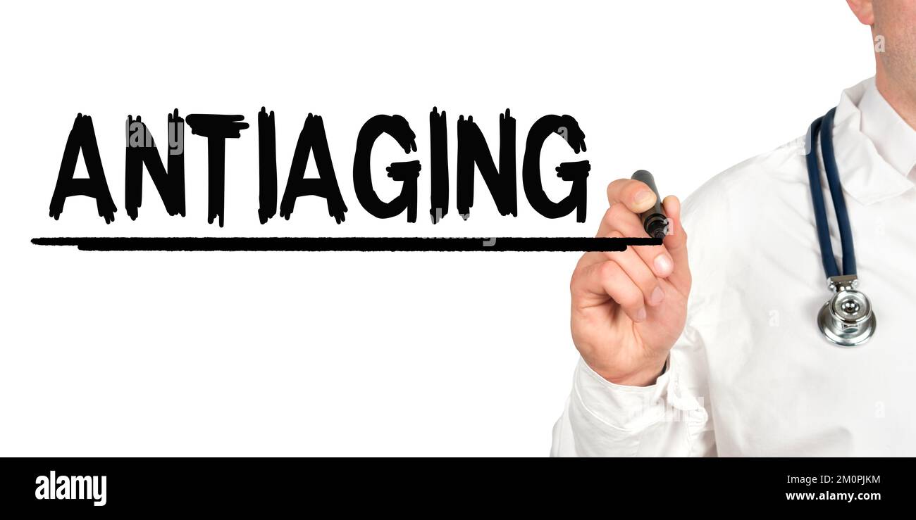 Medicine concept. Doctor writes the word - ANTIAGING. Image of a hand ...
