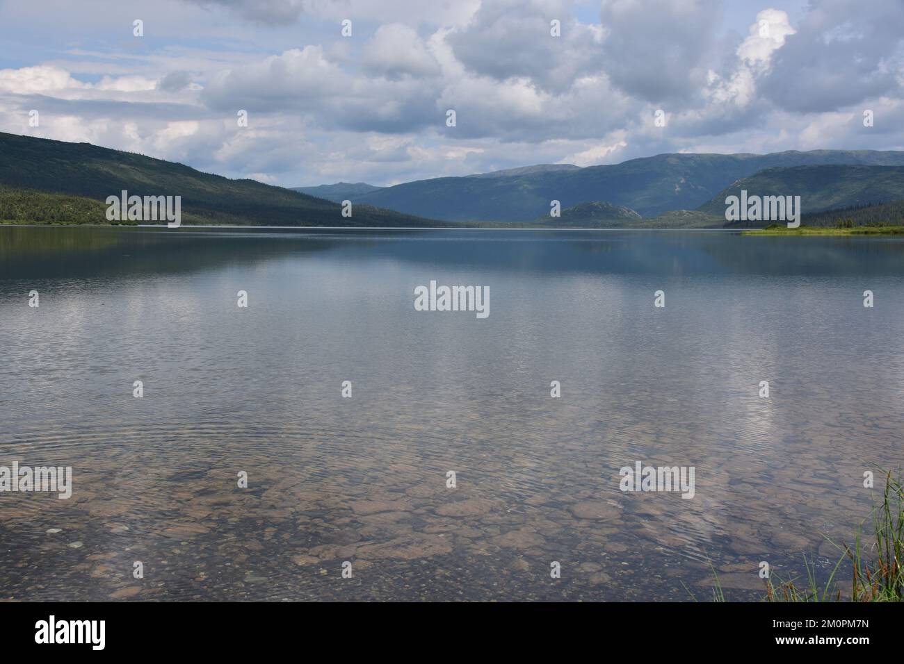 Wonder Lake reflecting the mountains Stock Photo - Alamy