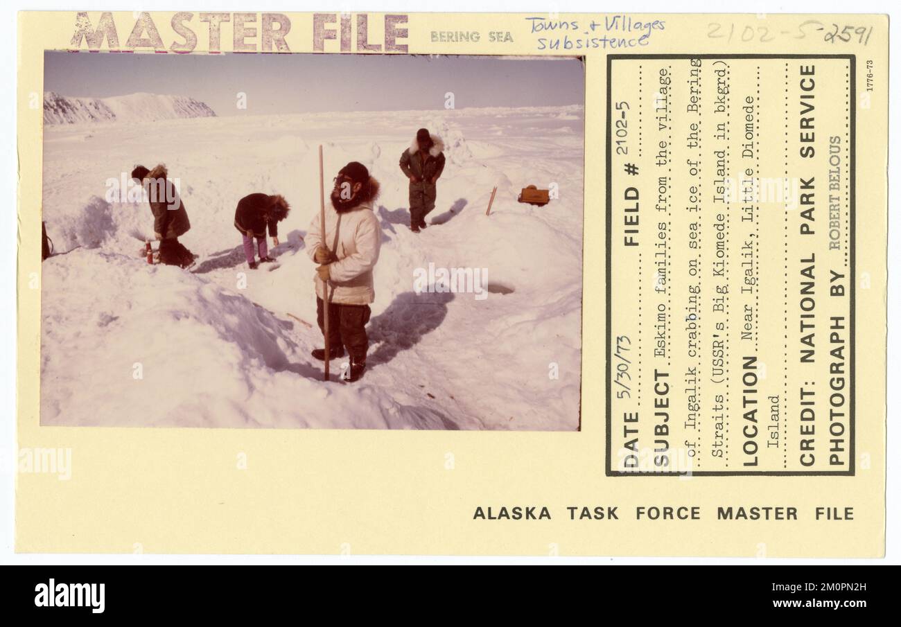 Eskimo families from the village of Ingalik crabbing on sea ice of the ...