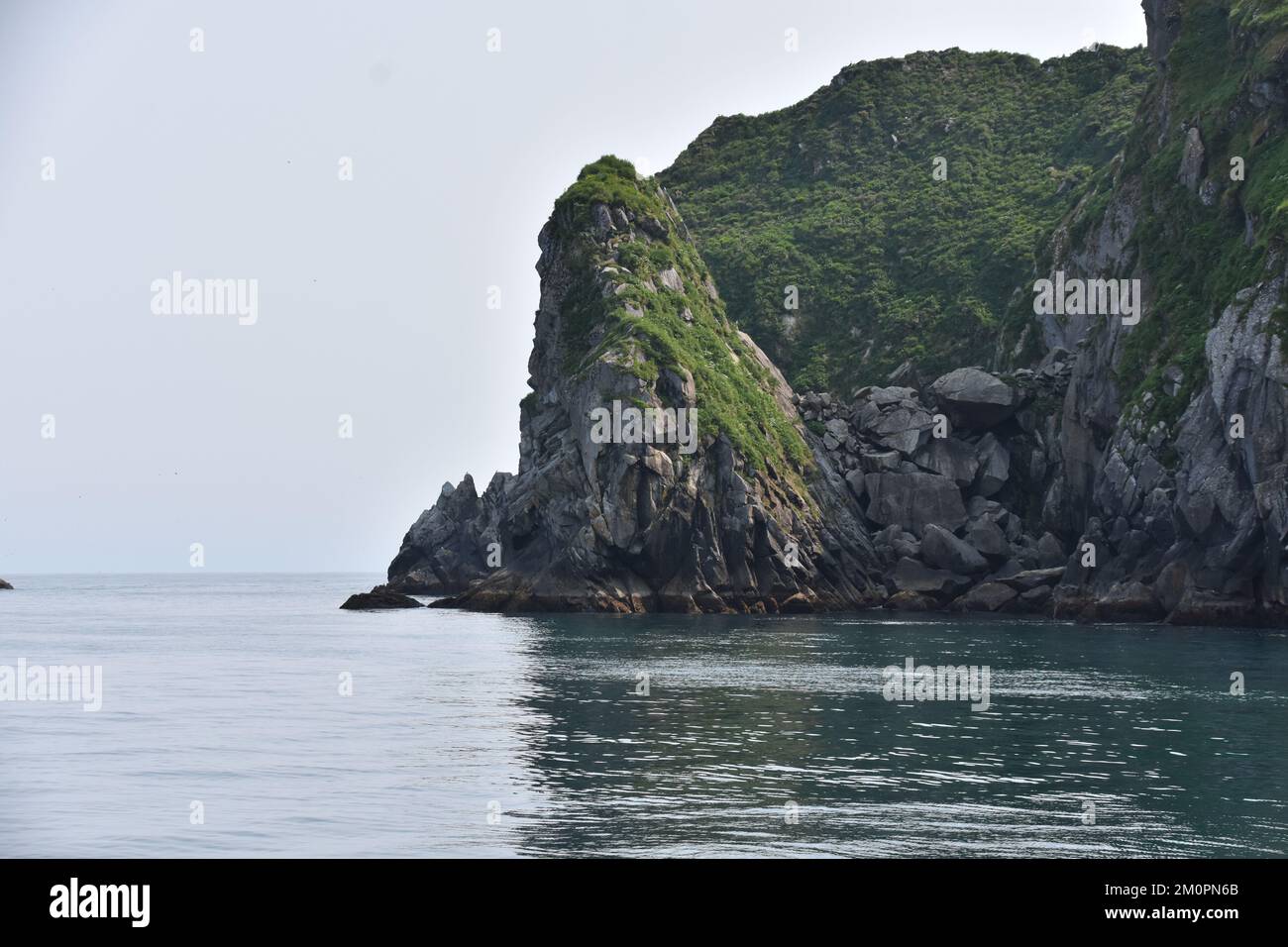 Scenery rocky mountains trees ocean hi-res stock photography and images ...
