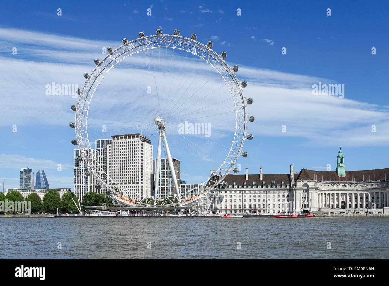 Ferris wheel behind blue sky hi-res stock photography and images - Alamy