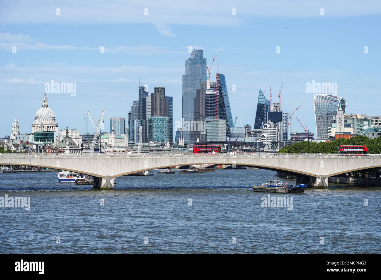 The City of London skyline with the River Thames and Waterloo Bridge, London England United ...