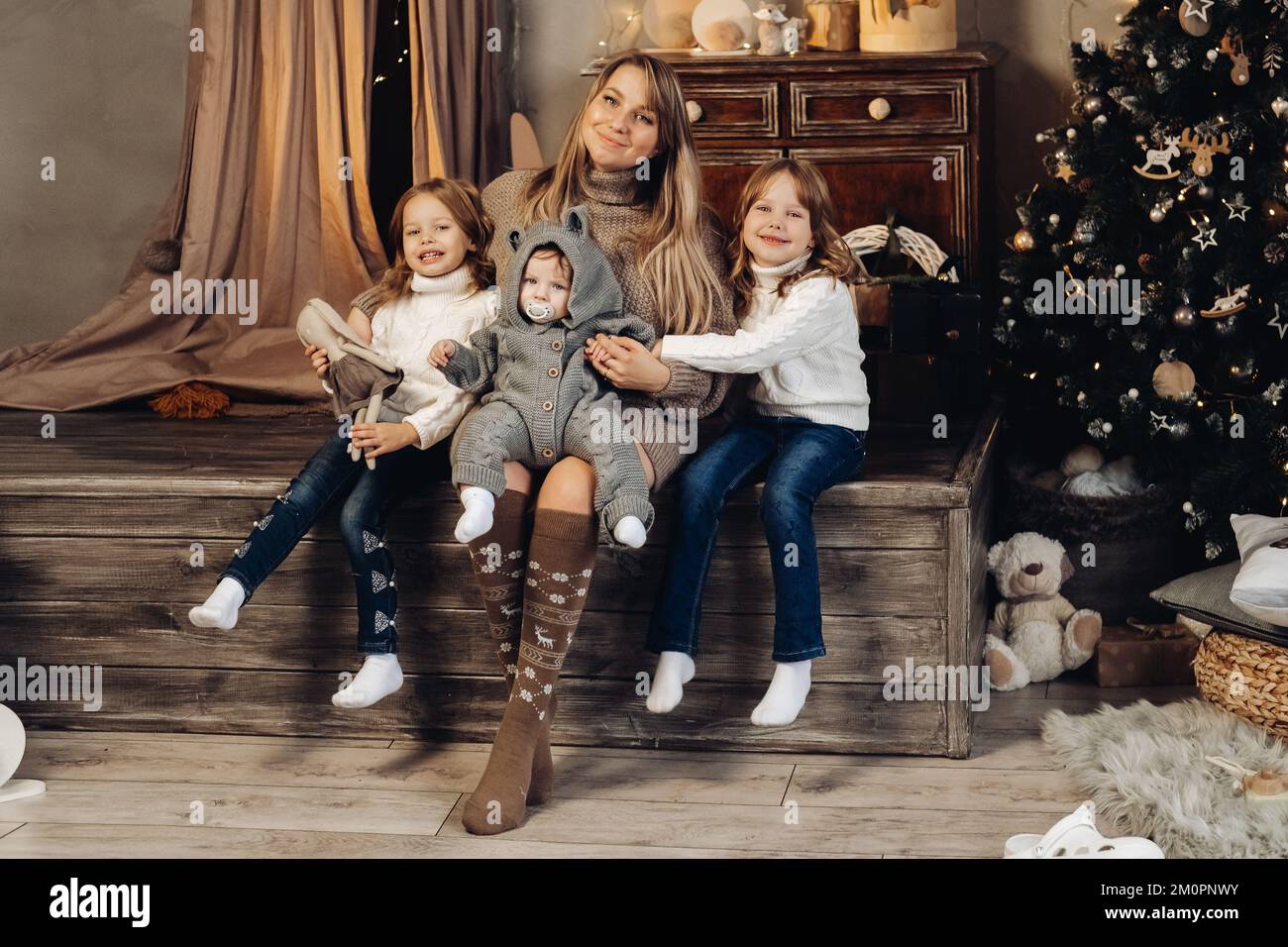 Beautiful mother three cheerful hi-res stock photography and images - Alamy