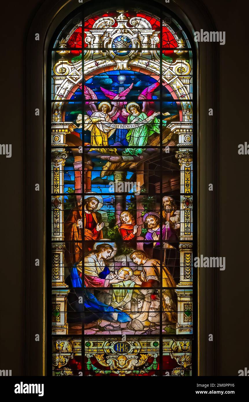 A stained glass window depicting the nativity of Jesus is pictured at ...