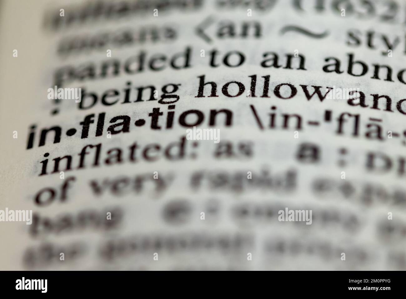 The word inflation written in dictionary Stock Photo - Alamy