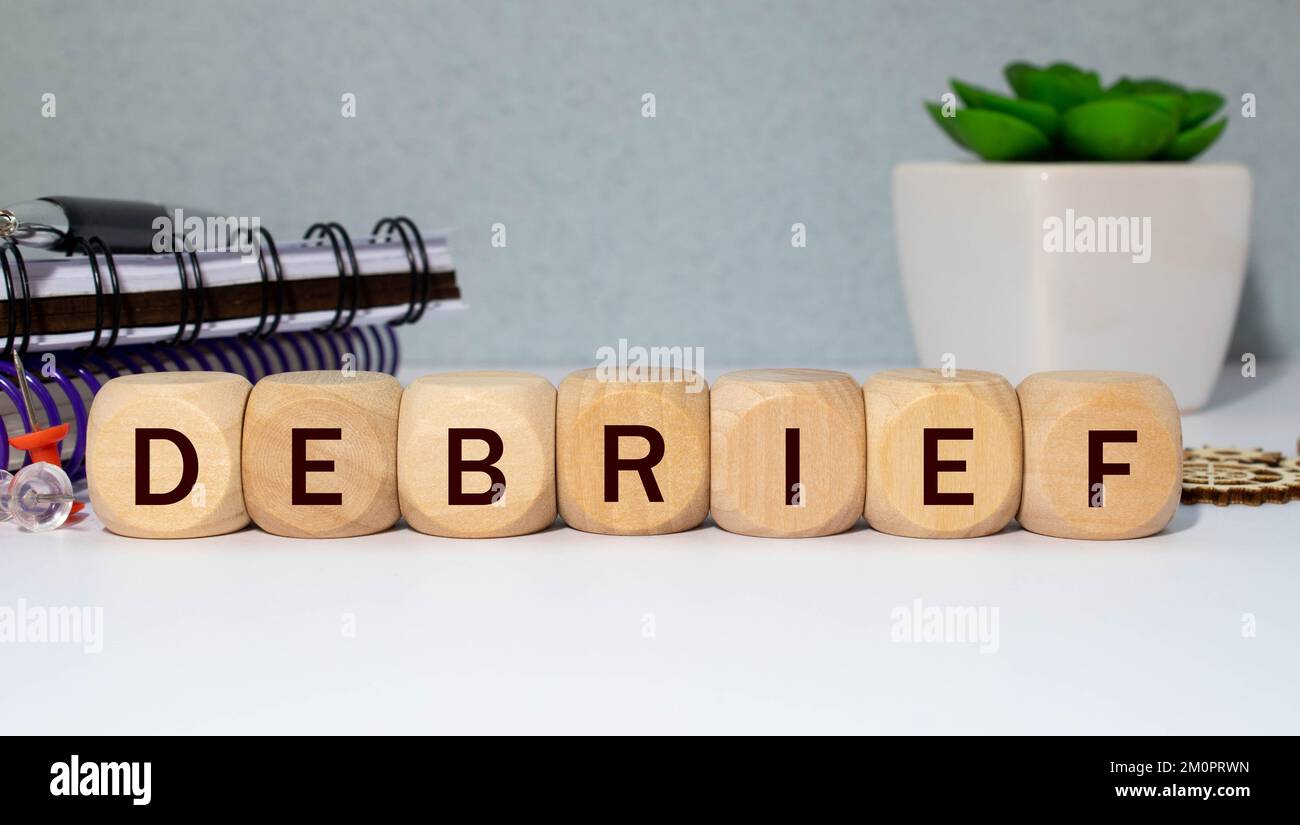 debrief word in a dictionary. debrief concept Stock Photo - Alamy