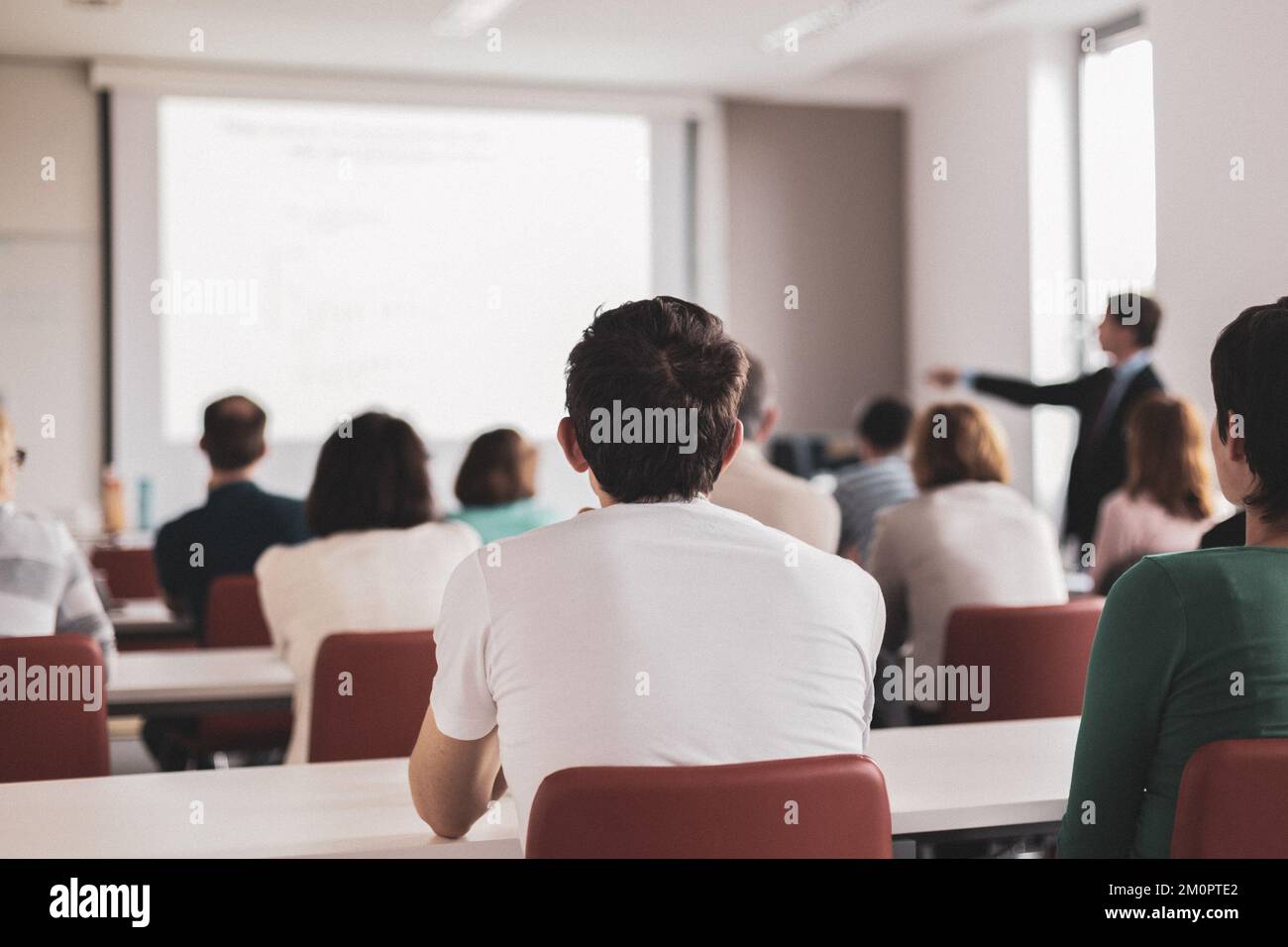 Speaker Giving a Talk at Business Meeting. Audience in the conference ...