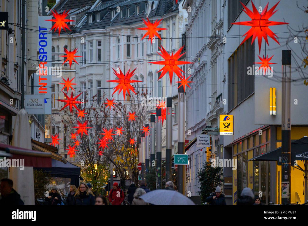 BONN, GERMANY - DECEMBER 6, 2022: Christmas lights above a shopping ...