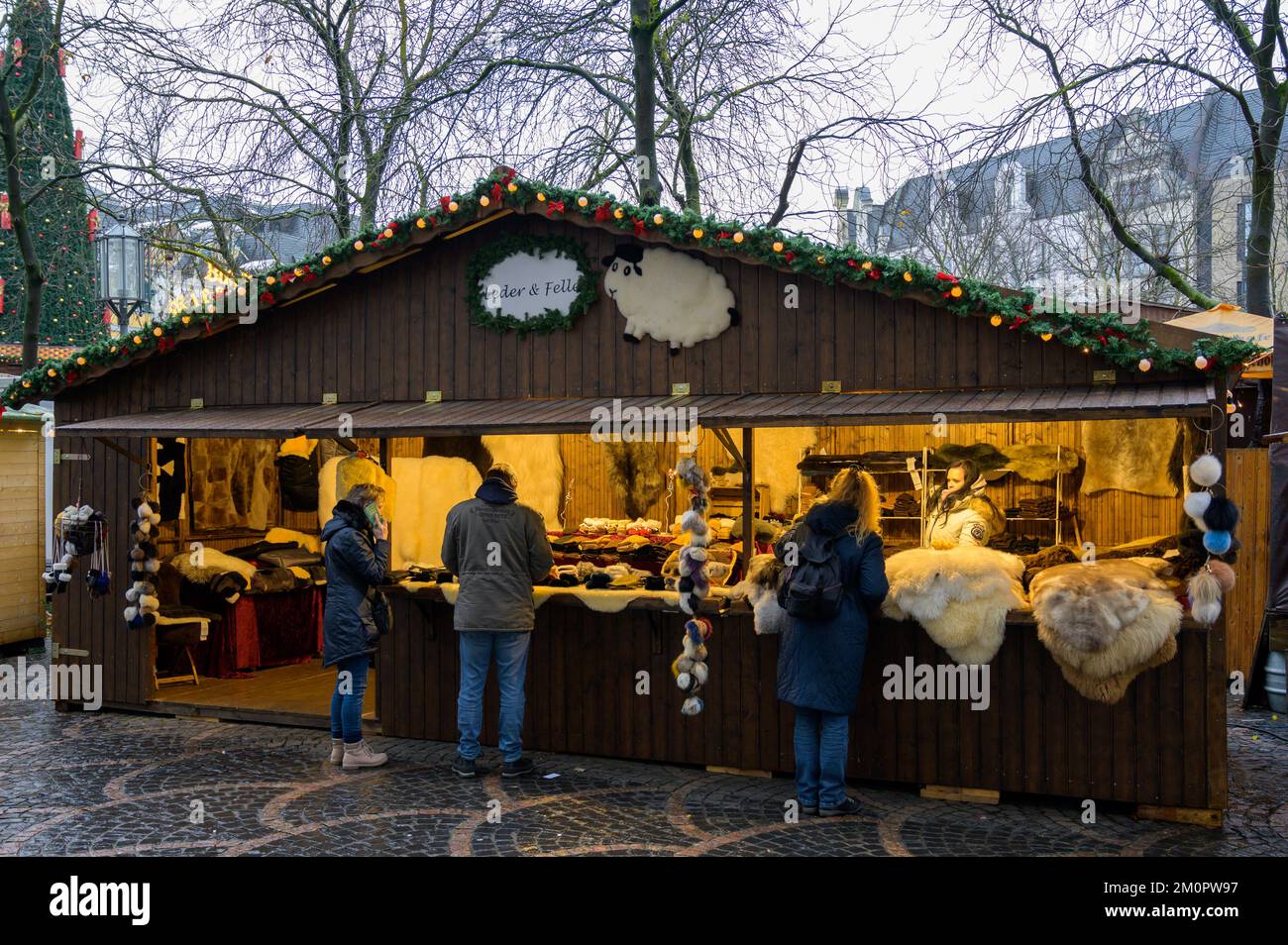 BONN, GERMANY - DECEMBER 6, 2022: Market vendor selling wool and ...