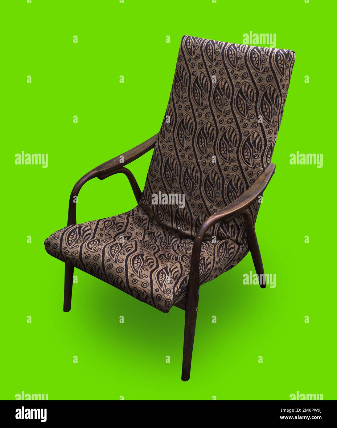 chair armchair, with a back upholstered in material, on a green ...