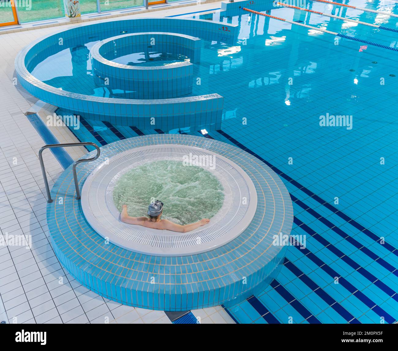 Top view of a circle indoor jacuzzi in a swimming pool complex with one ...
