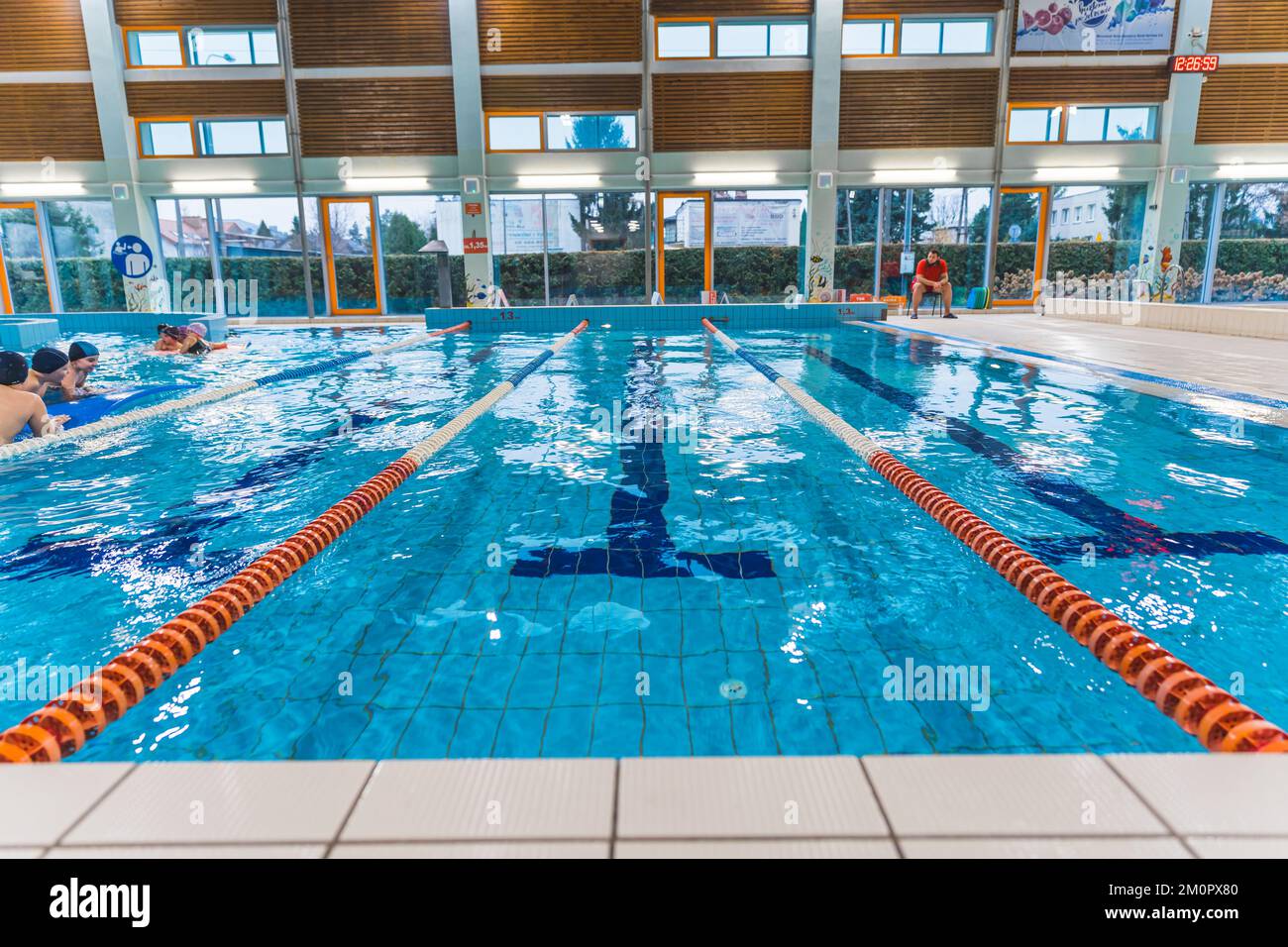 Indoor shot with central focus on swimming track. Indoor swimming pool ...