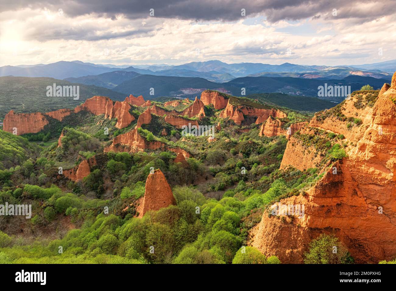 A drone shot of Roman gold mines of the marrows with cloudy sky in Leon ...