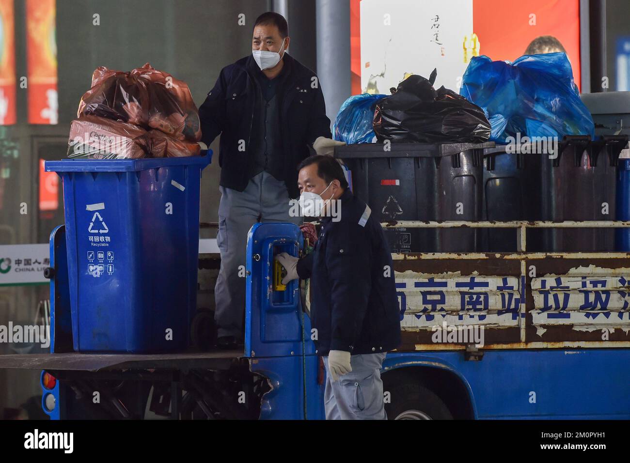 NANJING, CHINA - DECEMBER 7, 2022 - Staff members clean up garbage at ...