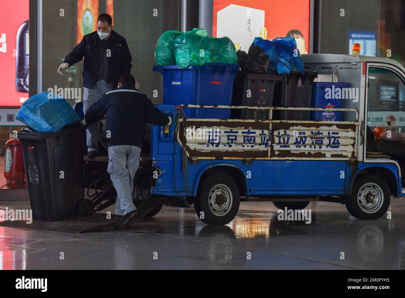 NANJING, CHINA - DECEMBER 7, 2022 - Staff members clean up garbage at ...