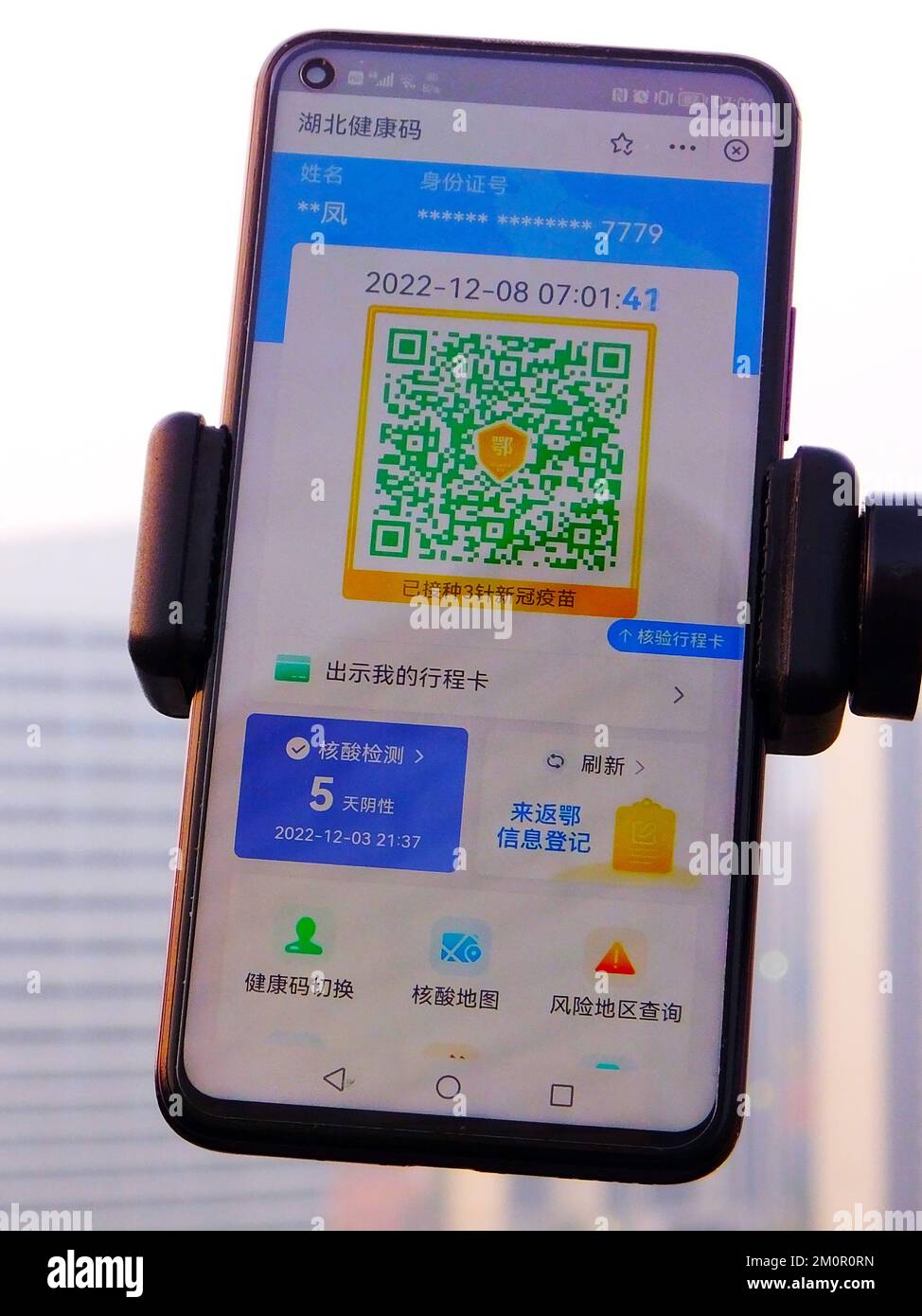 YICHANG, CHINA - DECEMBER 8, 2022 - A citizen shows nucleic acid ...