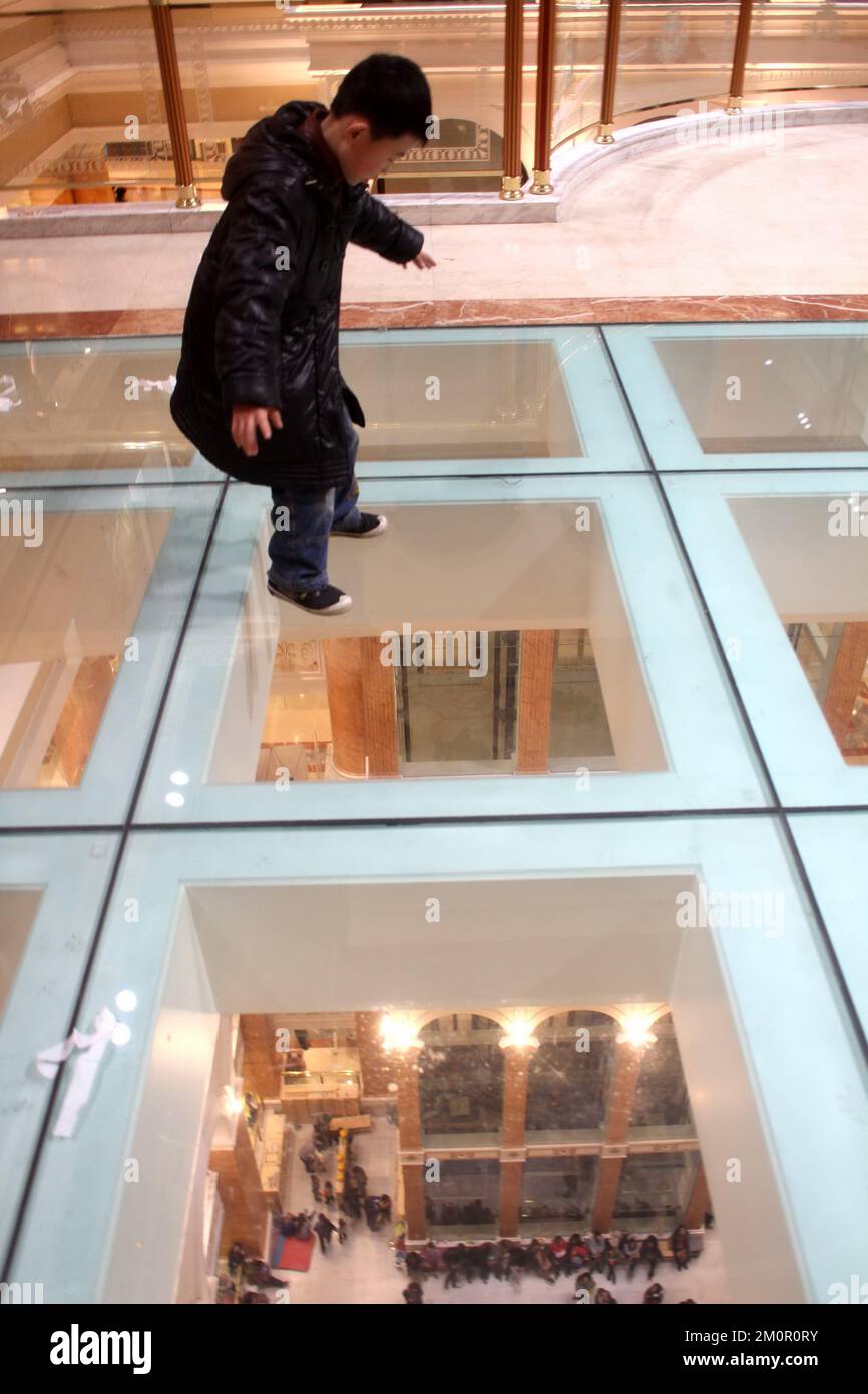 (FILE) SHANGHAI, CHINA - FEBRUARY 4, 2014 - Tourists experience the ...