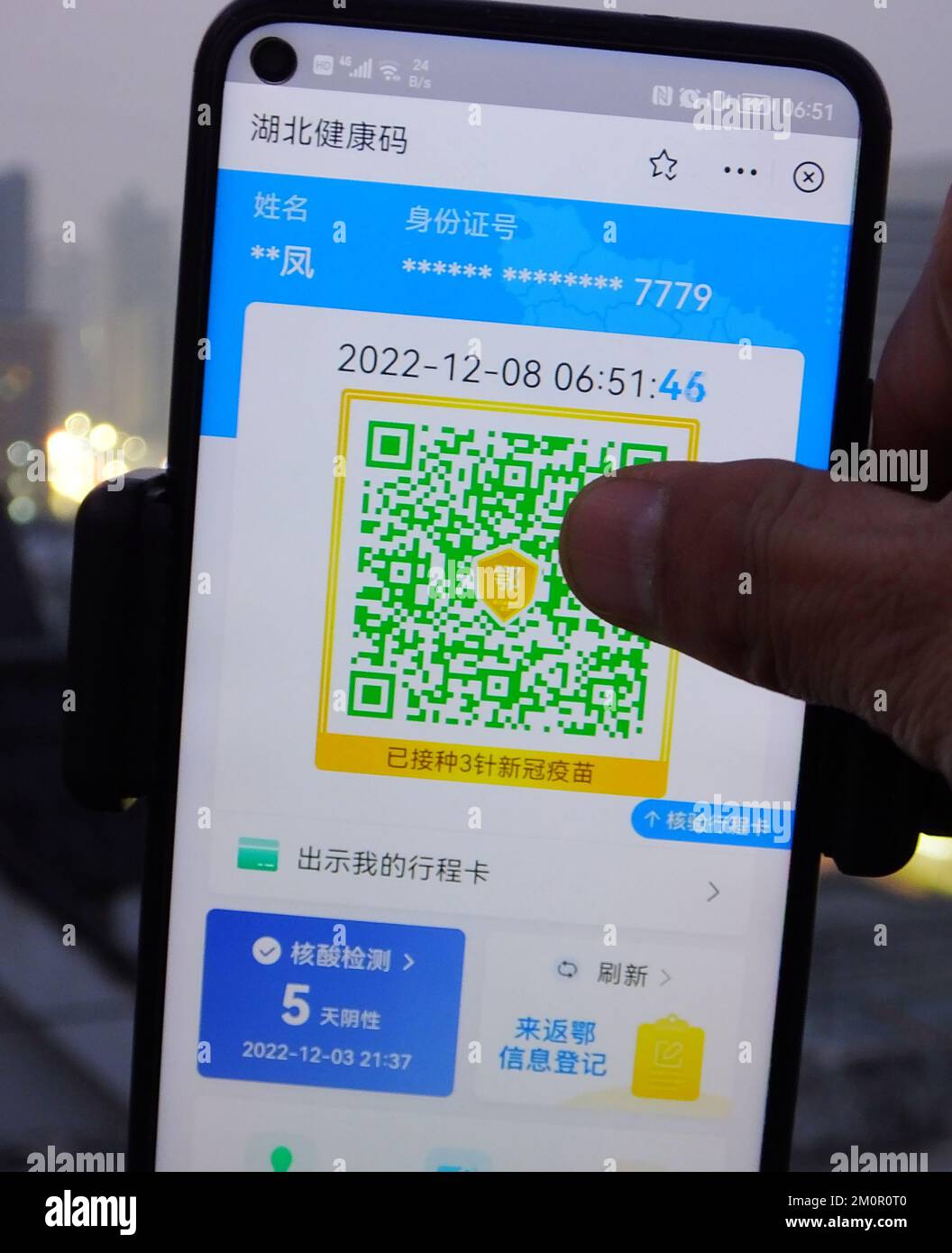 YICHANG, CHINA - DECEMBER 8, 2022 - A citizen shows nucleic acid ...