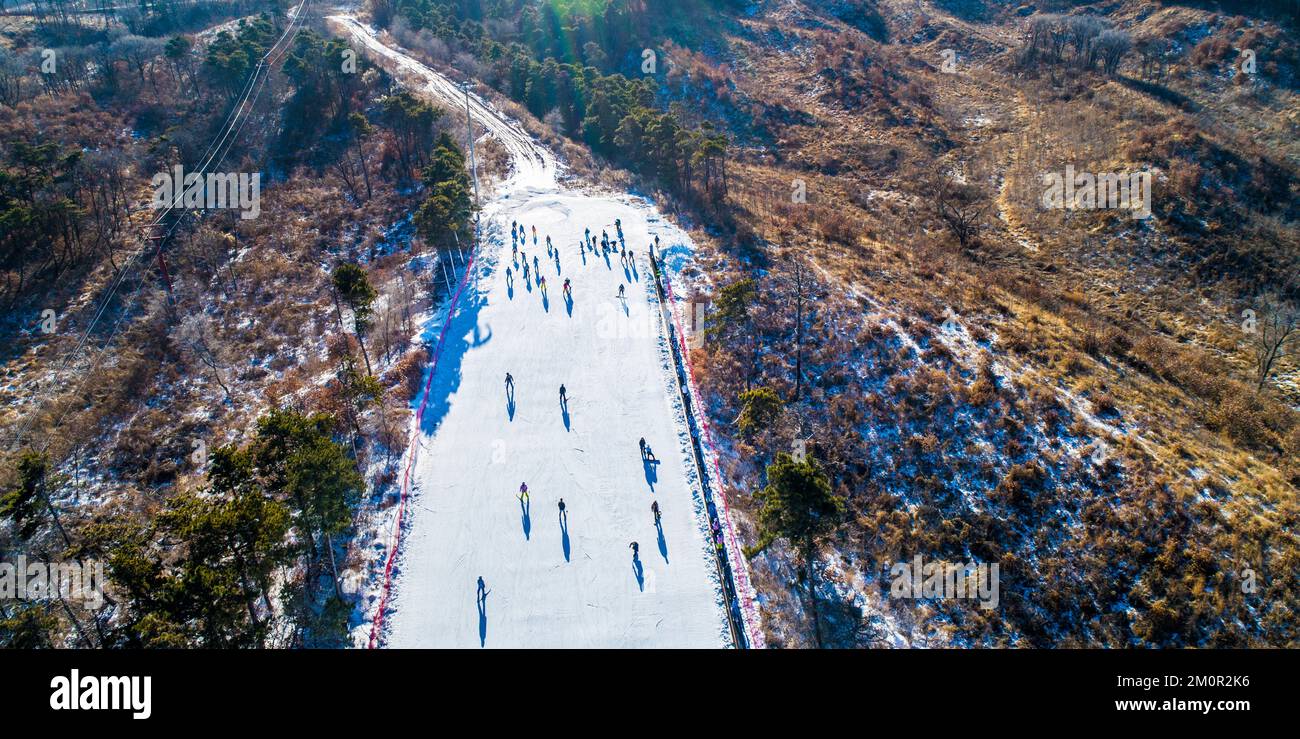 Aerial photos show tourists skiing at Qipan Mountain Ice and Snow World ...