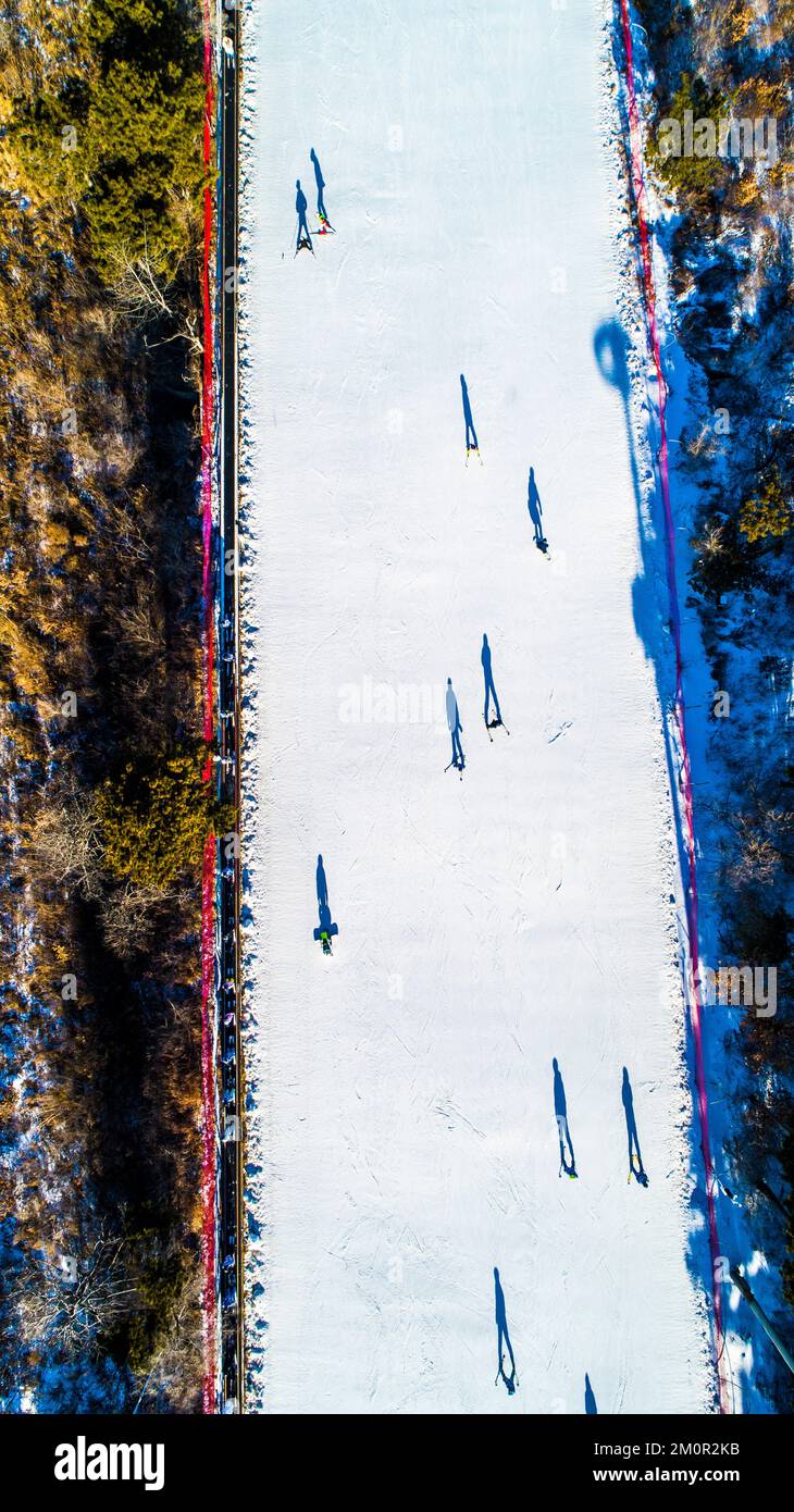 Aerial photos show tourists skiing at Qipan Mountain Ice and Snow World ...