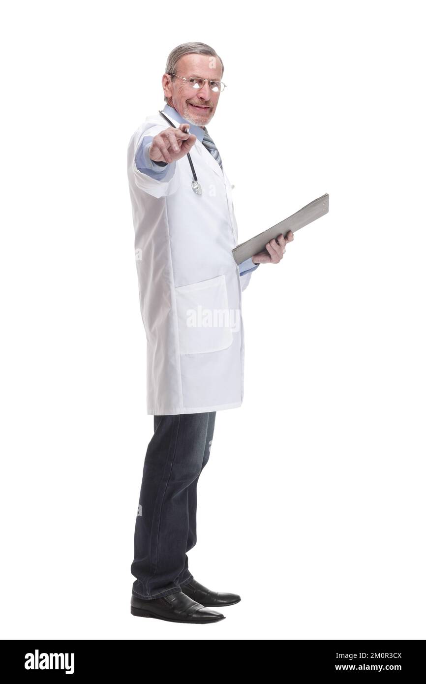 Side view of concentrated male doctor writing reports Stock Photo - Alamy