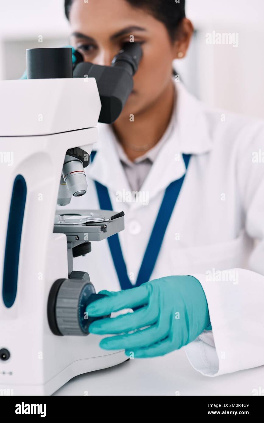 The eye of every scientist. an attractive young female scientist ...