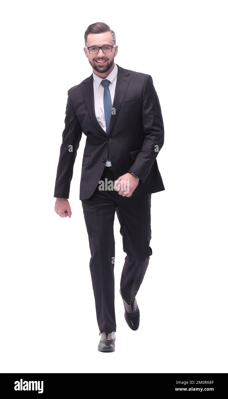 confident young businessman moving forward. isolated on white Stock ...