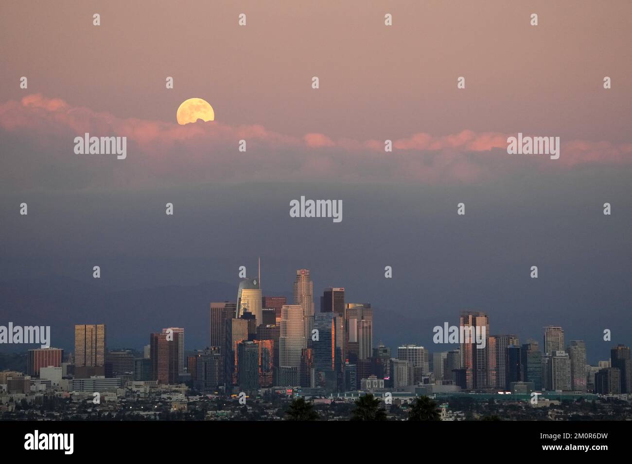 Full moon rises over downtown los angeles skyline on wednesday hi-res ...