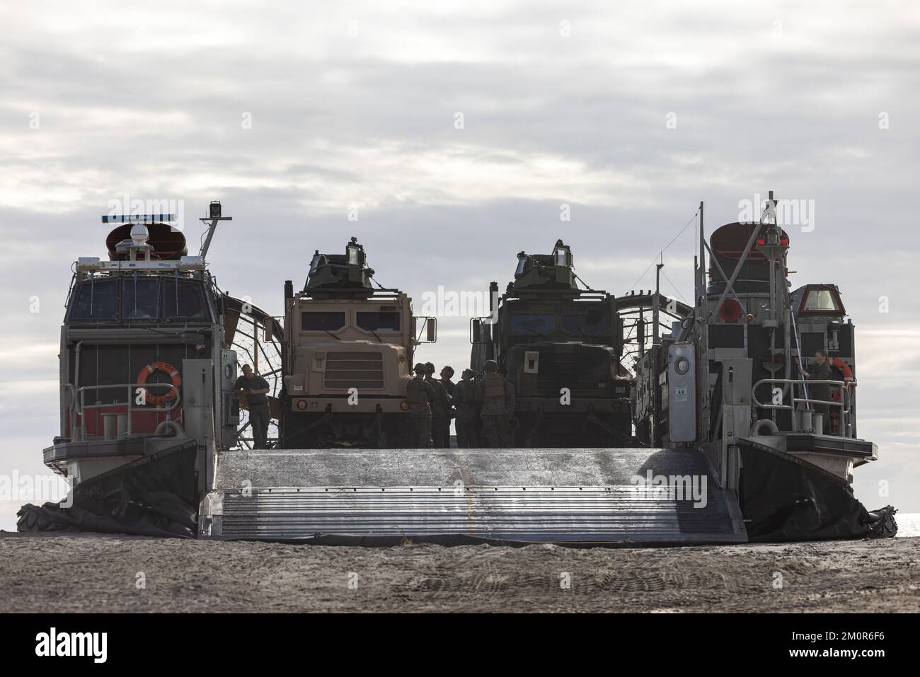 A U.S. Navy landing craft air cushion (LCAC) with Assault Craft Unit 4 ...