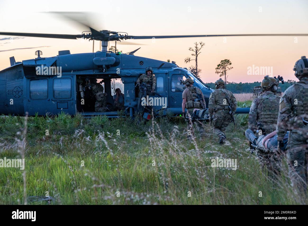 920th Rescue Wing pararescuemen litter carry patients simulating ...