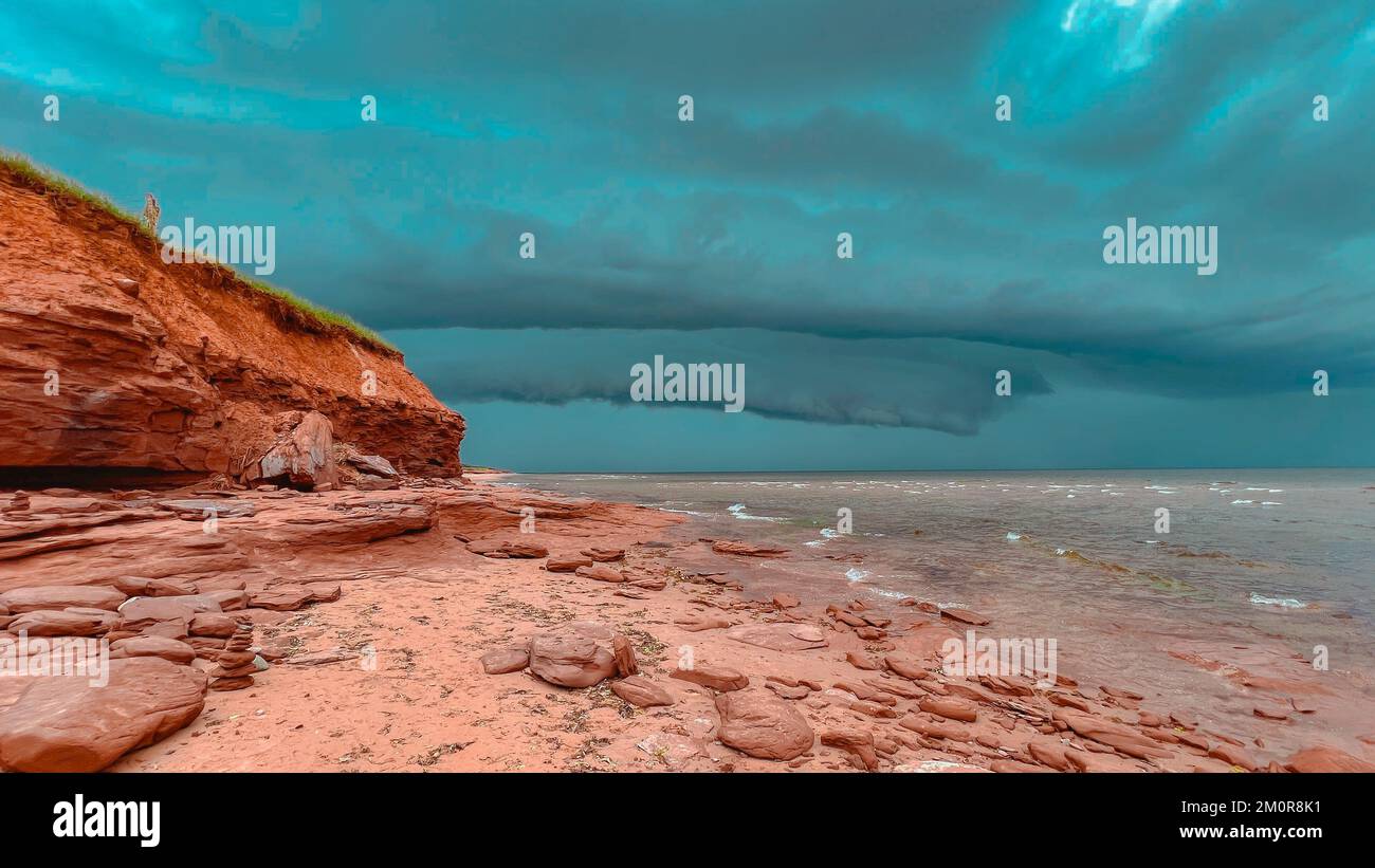 Red Sand Rock & Red Sand Beach in Prince Edward Island Stock Photo - Alamy