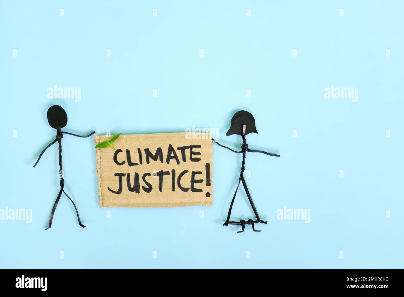 Climate justice concept. People stick figures protesting while holding ...