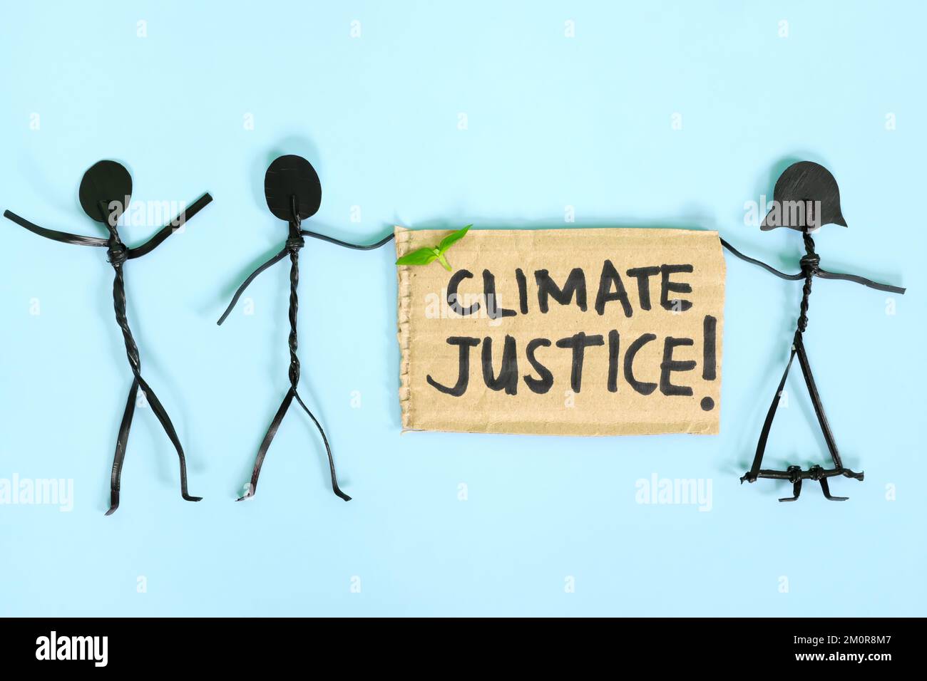 Climate justice concept. People stick figures protesting while holding ...