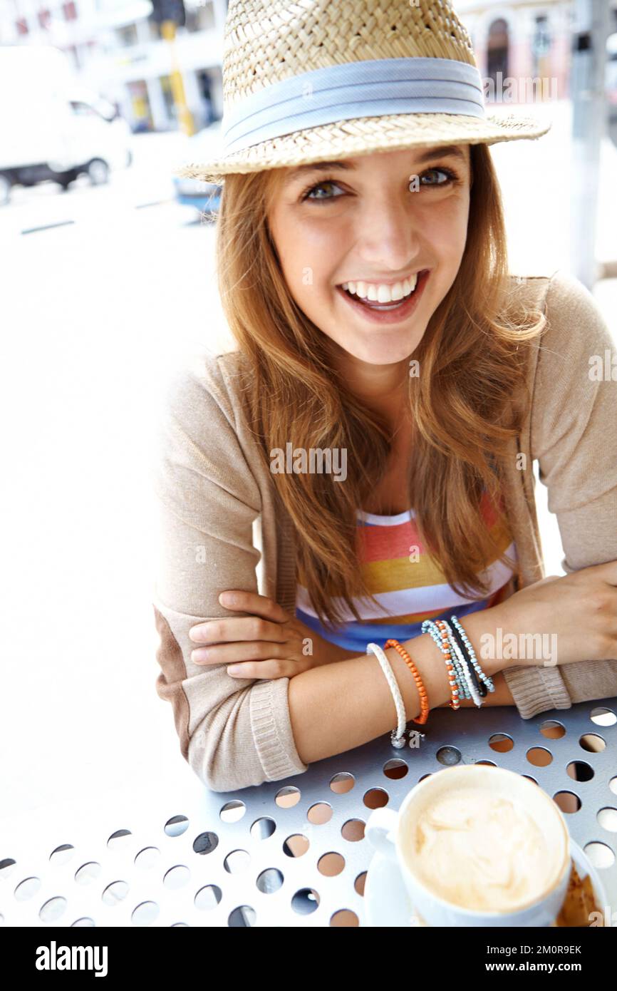 Smiling young woman sitting cafe hi-res stock photography and images ...
