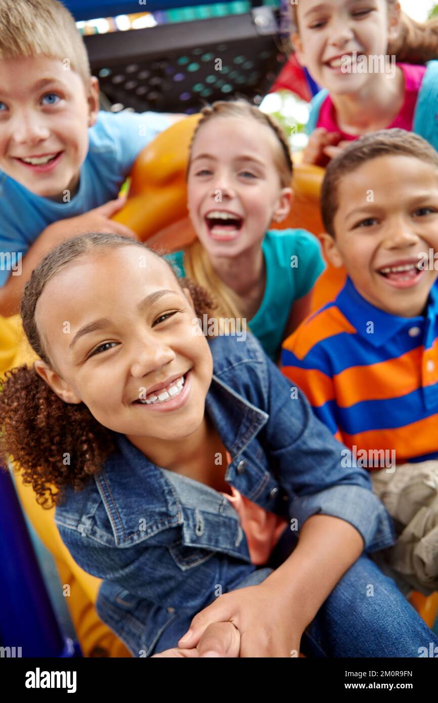 Filled with childhood innocence. A happy group of multi-ethnic children ...