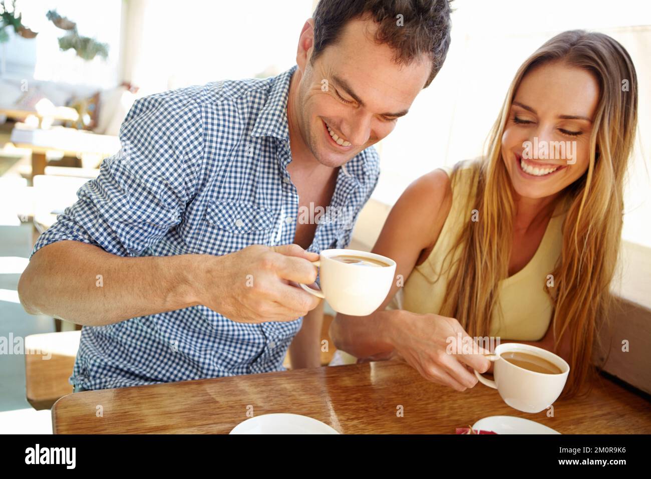 Sharing coffee cafe hi-res stock photography and images - Alamy