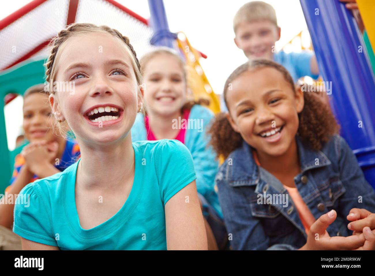 Filled with innocence and joy. A multi-ethnic group of happy children ...
