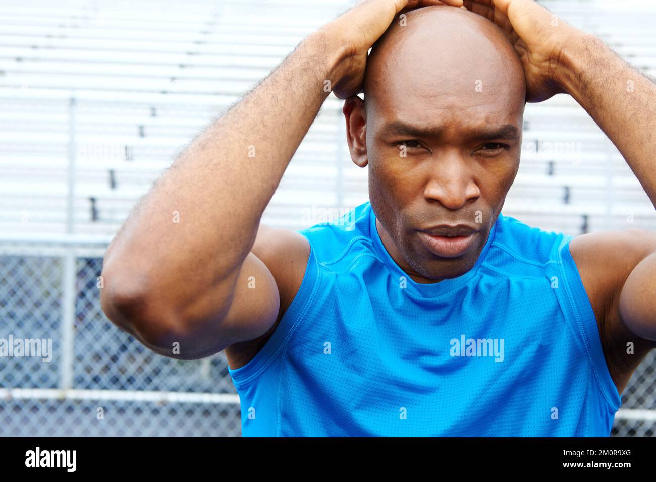 Focussing his thoughts before the race. Close up portrait of a male ...