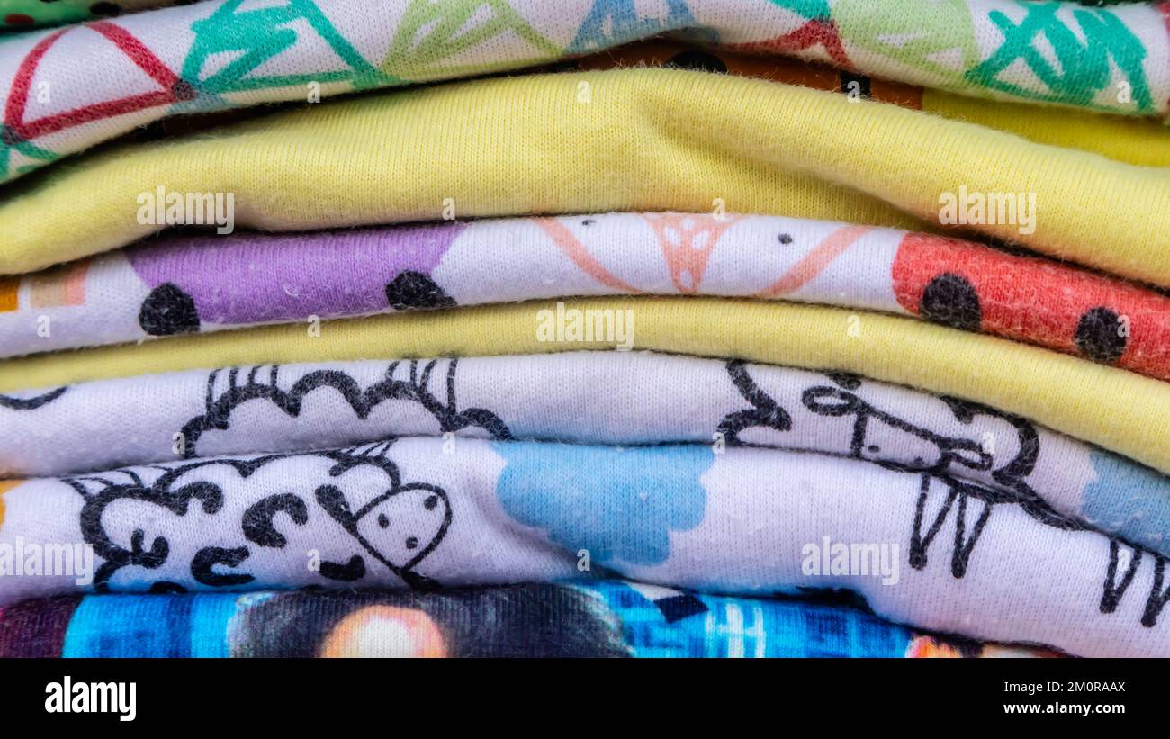 pile of clothes as background Stock Photo - Alamy